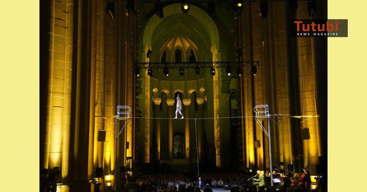 Philippe Petit recreates iconic high-wire walk on 50th anniversary ...